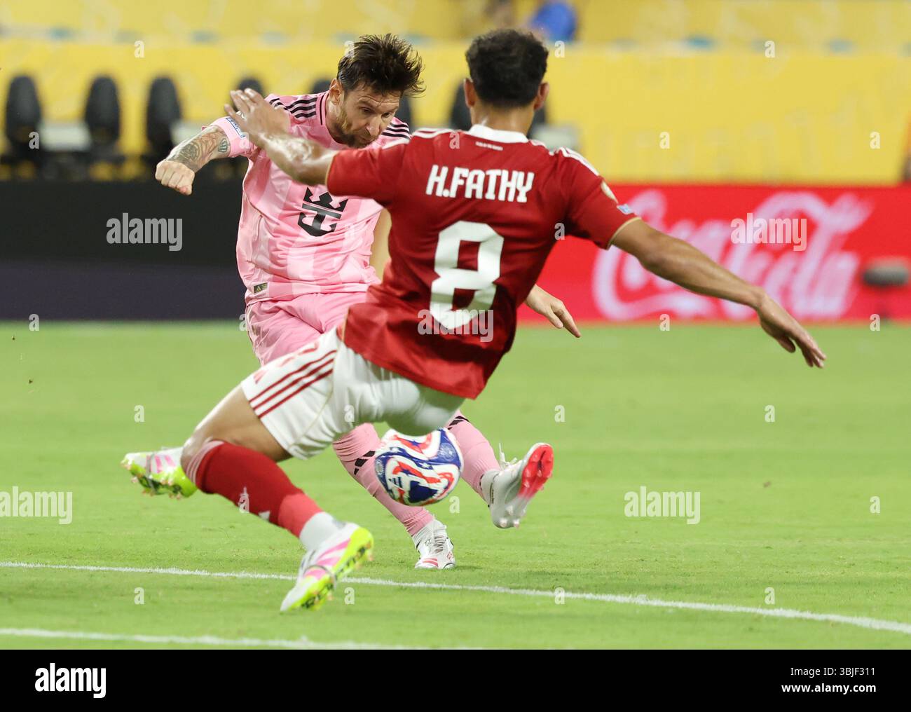 Inter Miami forward Lionel Messi (10) and Hamdy Fathy (8) of Al Ahly FC at the FIFA Club World ...