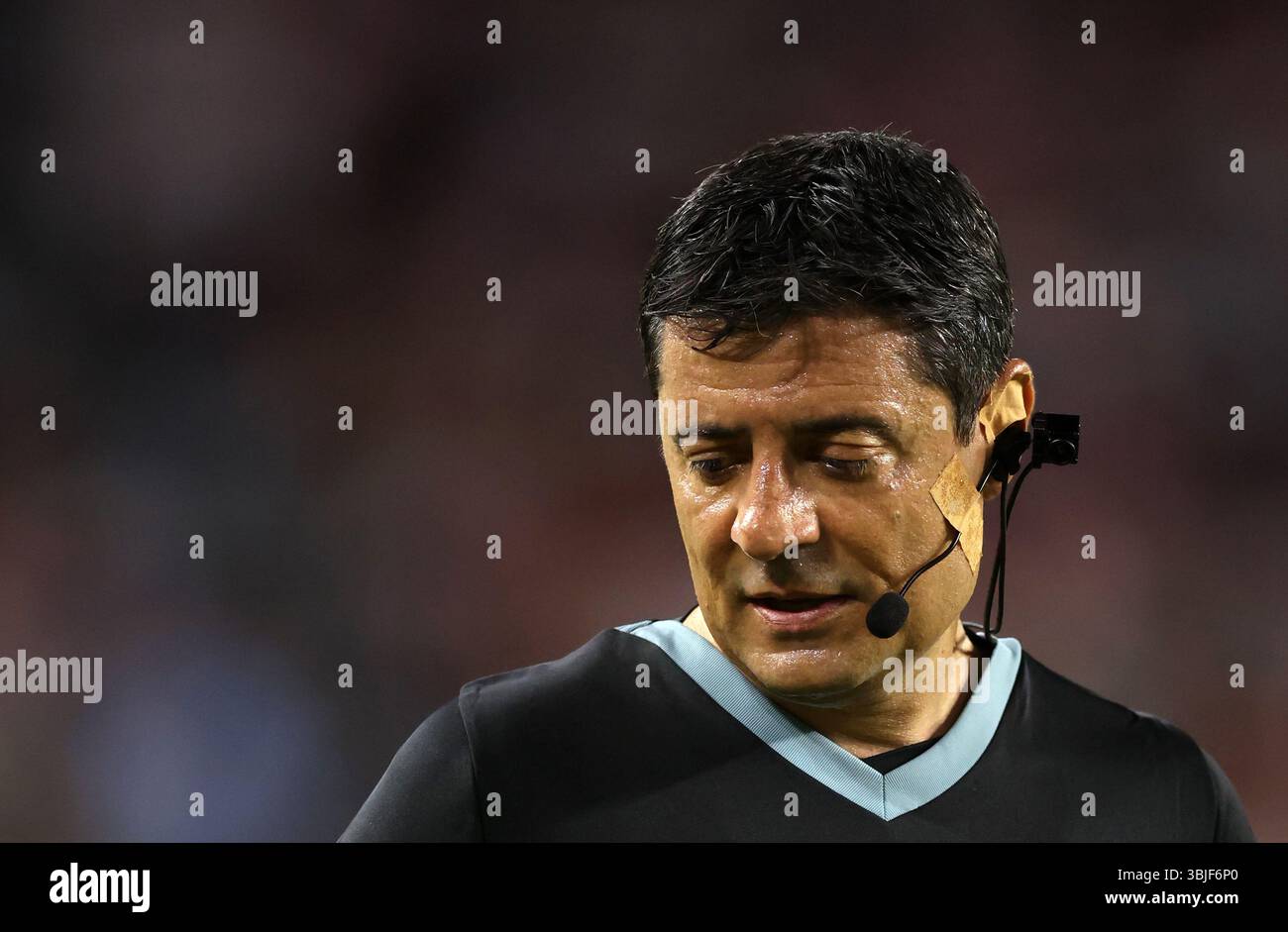 Miami Gardens, USA, 14th June 2025. Referee Alireza Faghani shows his ...