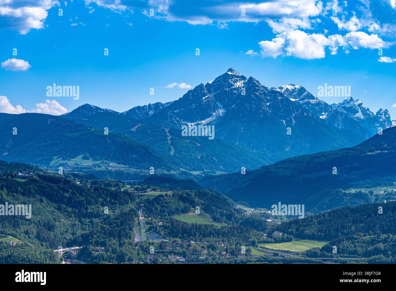 Stunning view of Serles peak with Bergisel ski jump and Wipptal valley ...