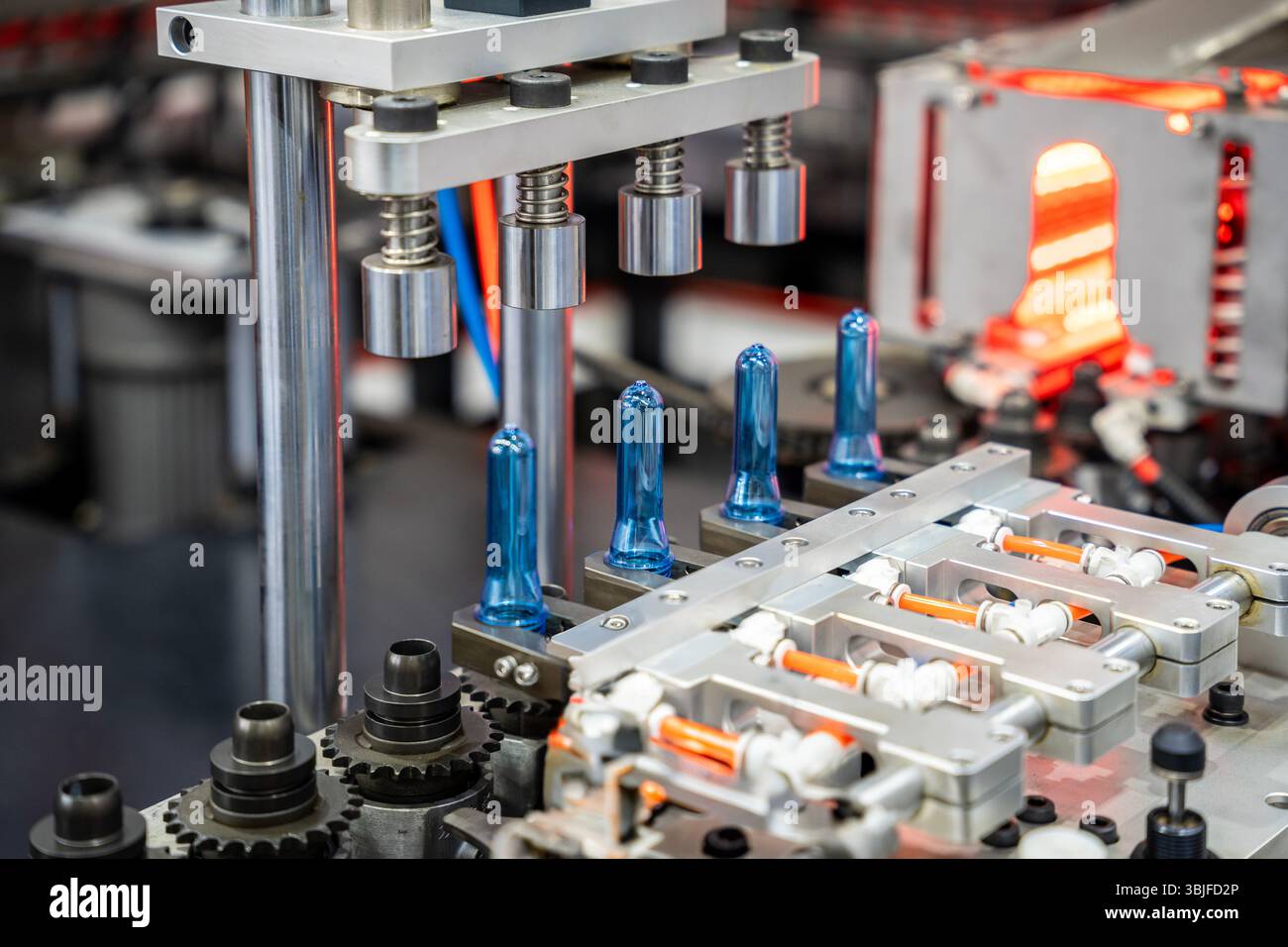Automatic PET Plastic Bottle Blow Moulding Machine Stock Photo - Alamy