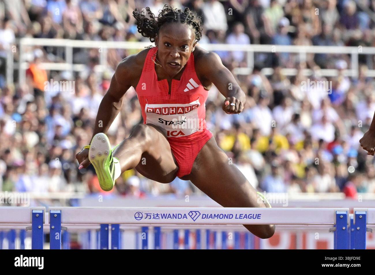 Grace Stark of the U.S., wins in the women's 100m hurdles during the ...
