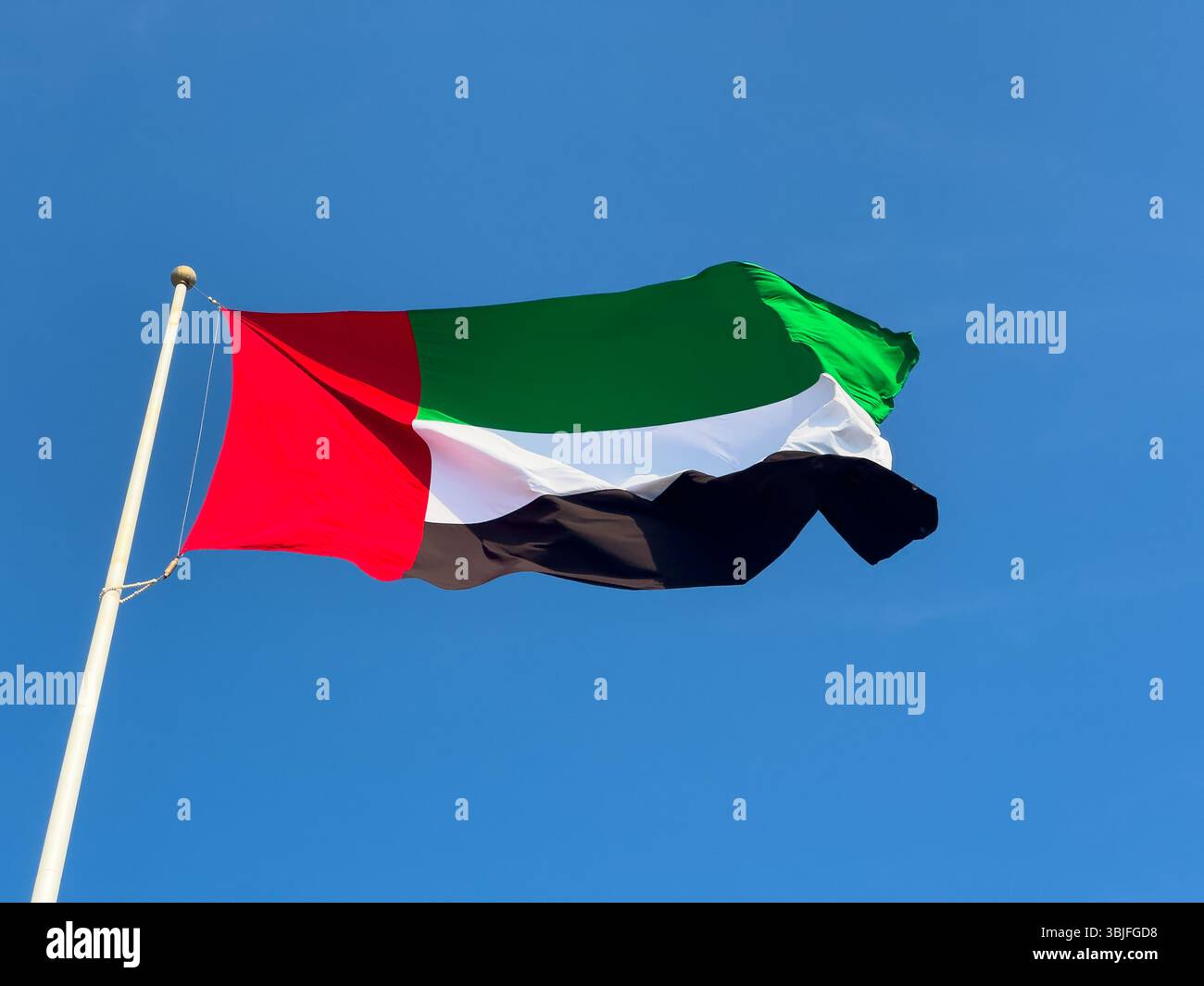 Flag of the UAE (United Arab Emirates) fluttering in the wind Stock ...