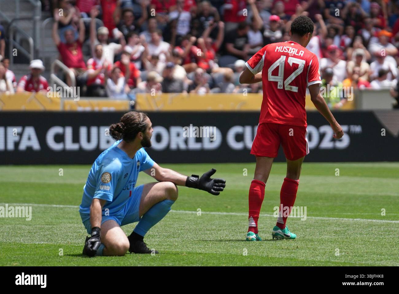 Bayern Munich's Jamal Musiala walks away from Auckland City's Conor ...