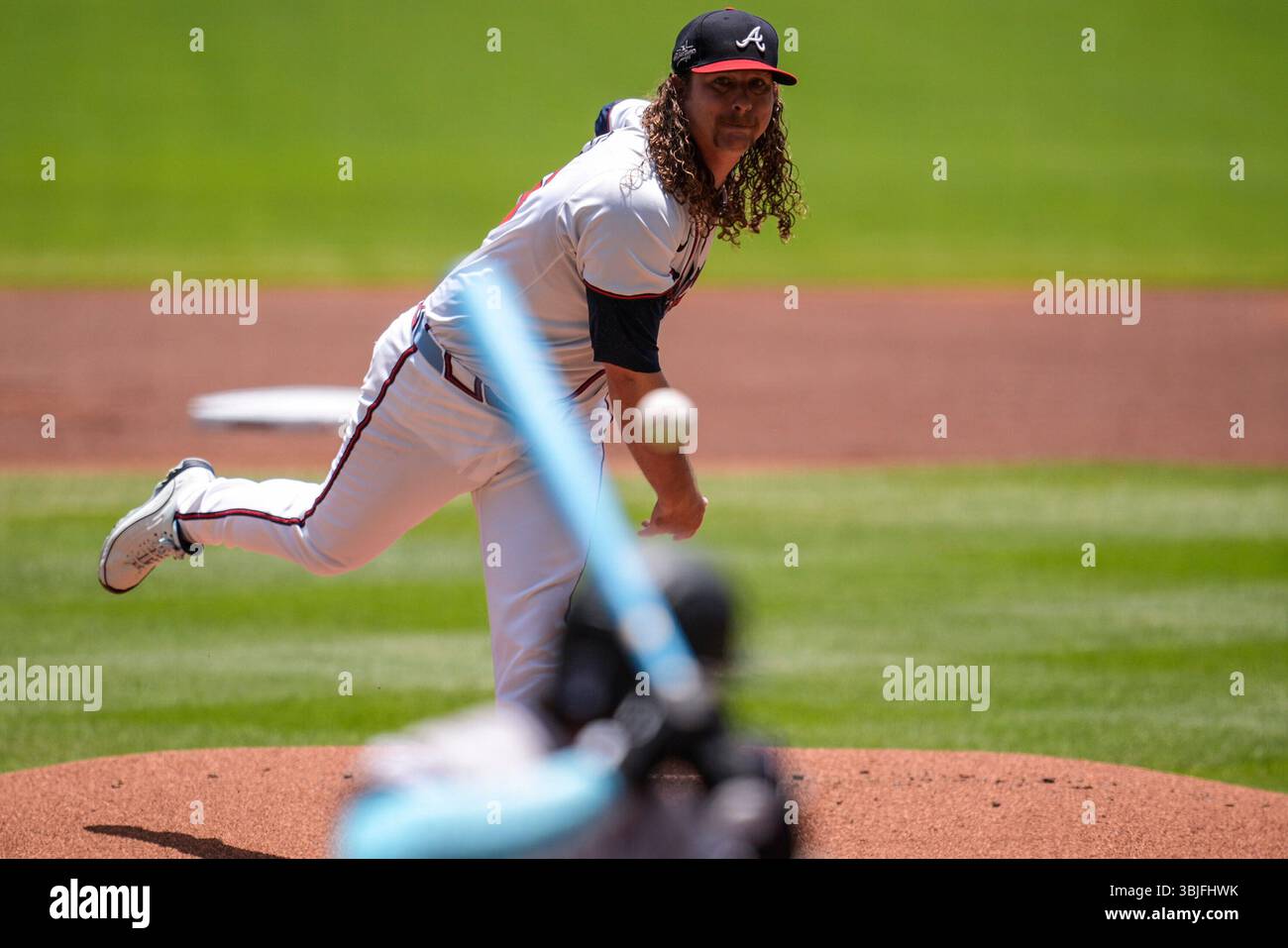 Atlanta Braves pitcher Grant Holmes (66) works against Colorado Rockies ...