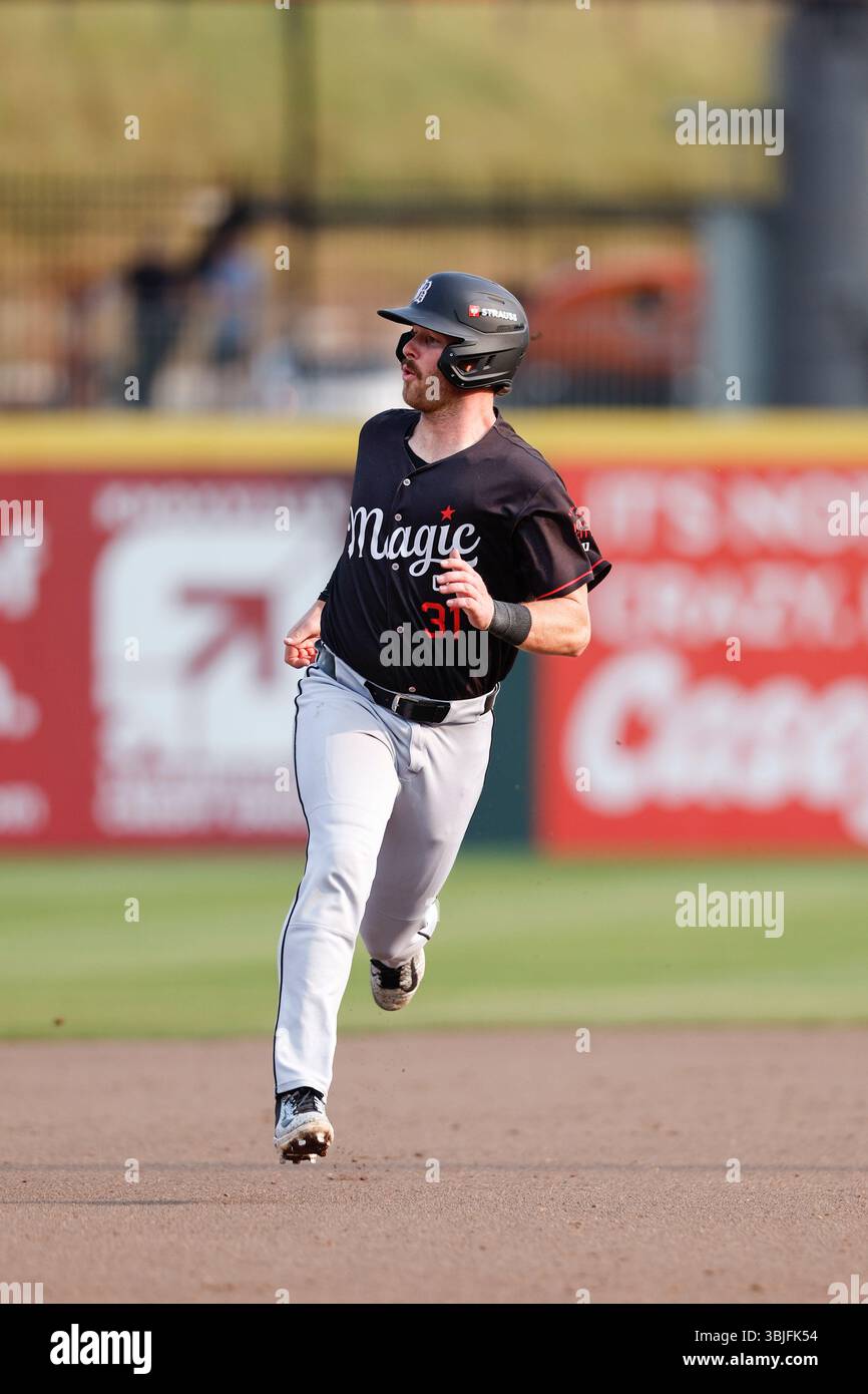 Birmingham Barons catcher Colby Smelley (31) hustles to third base ...