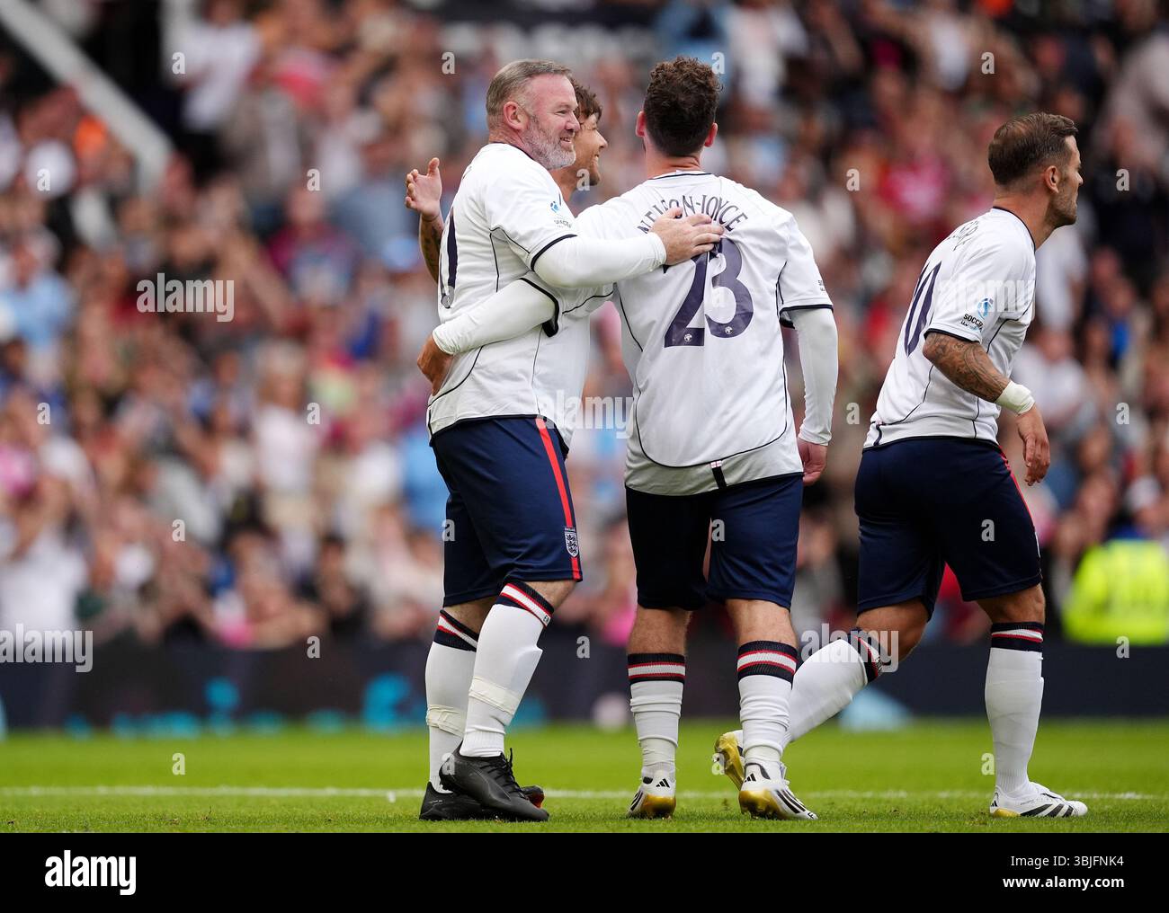 England player manager Wayne Rooney (left) celebrates scoring their ...