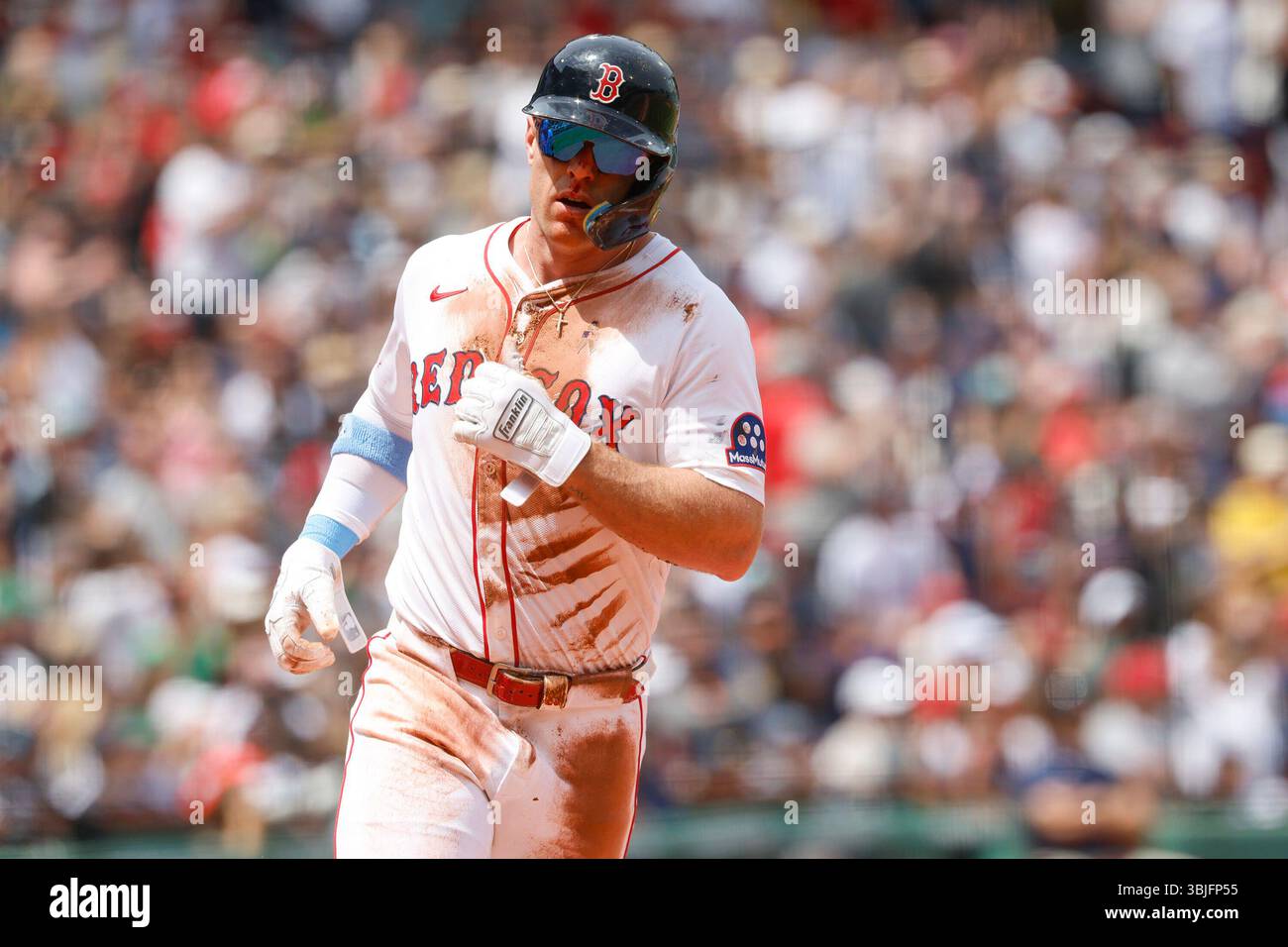 Boston Red Sox's Romy Gonzalez crosses home plate to score during in ...