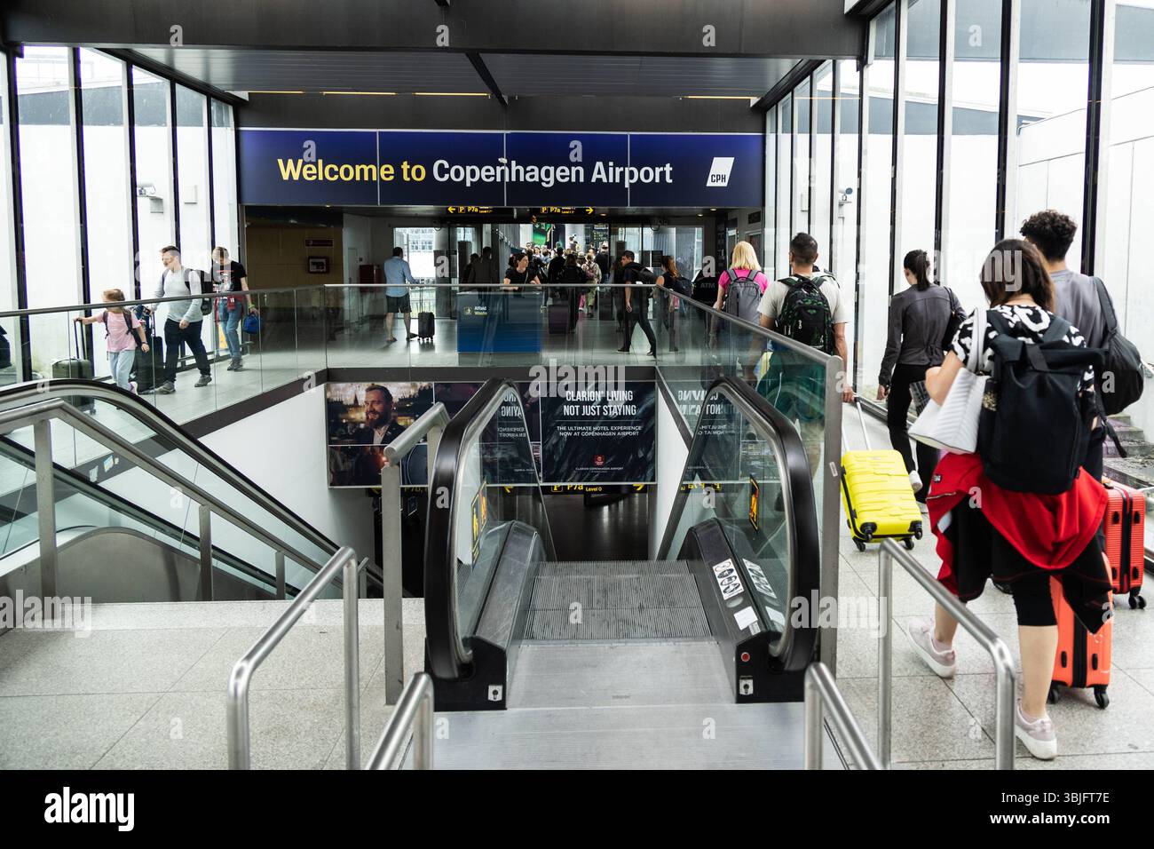 Passengers are greeted at Copenhagen Airport, Kastrup by a sign reading Welcome to Copenhagen ...
