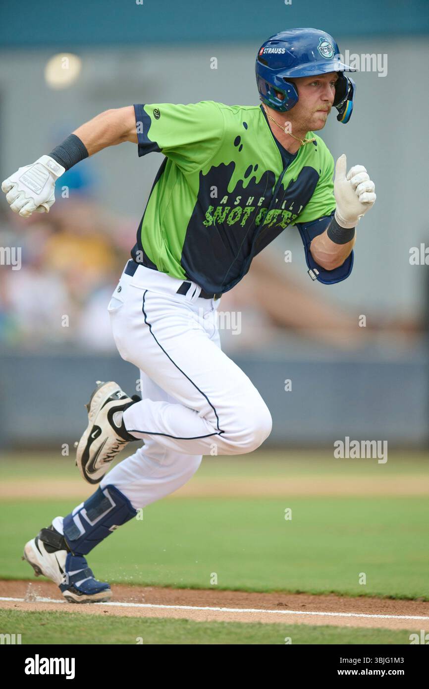 Asheville Snot Otters Walker Janek (12) runs to first base during a ...