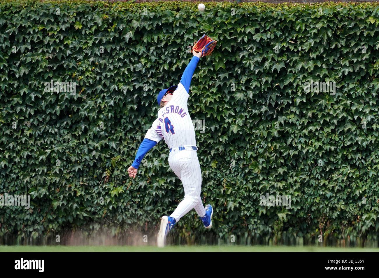 Chicago Cubs outfielder Pete Crow-Armstrong catches a ball hit by ...