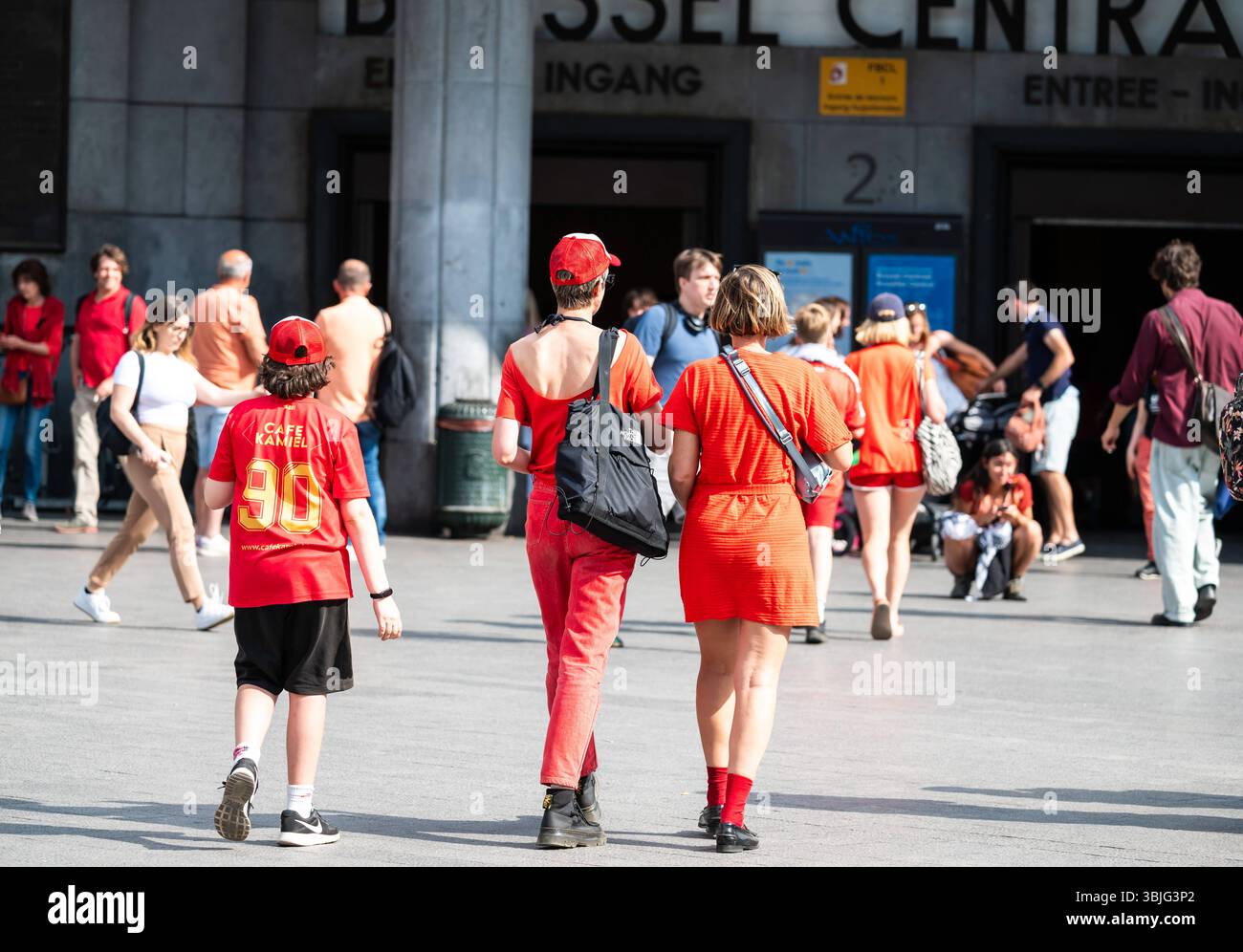 People in red clothes after the Gaza Palestine protest march, waking ...