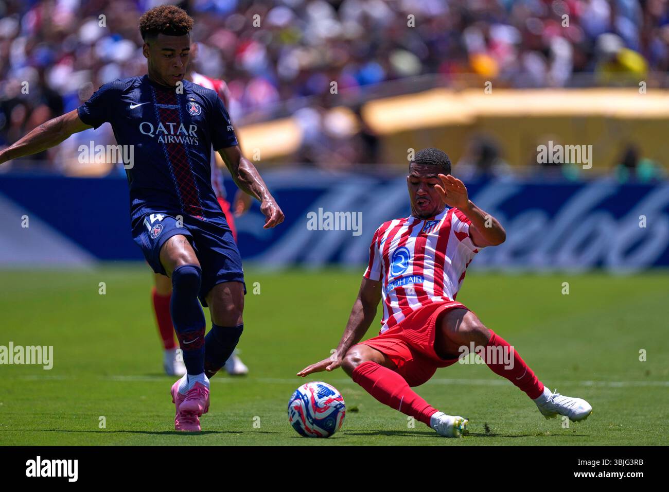 Atletico Madrid's Samuel Lino, right, vies for the ball with Paris ...