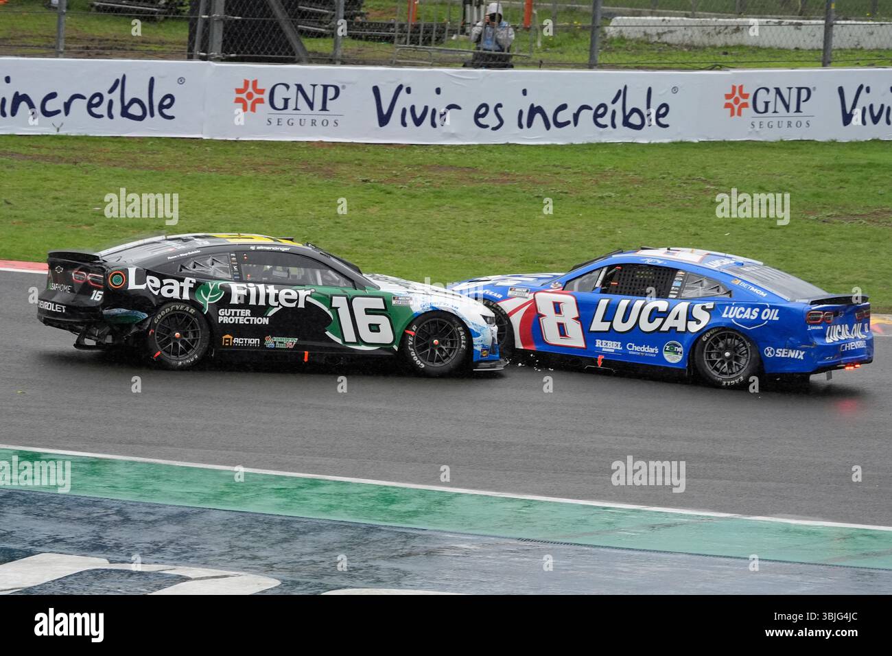 AJ Allmendinger, left, and Kyle Busch collide during a NASCAR Cup ...