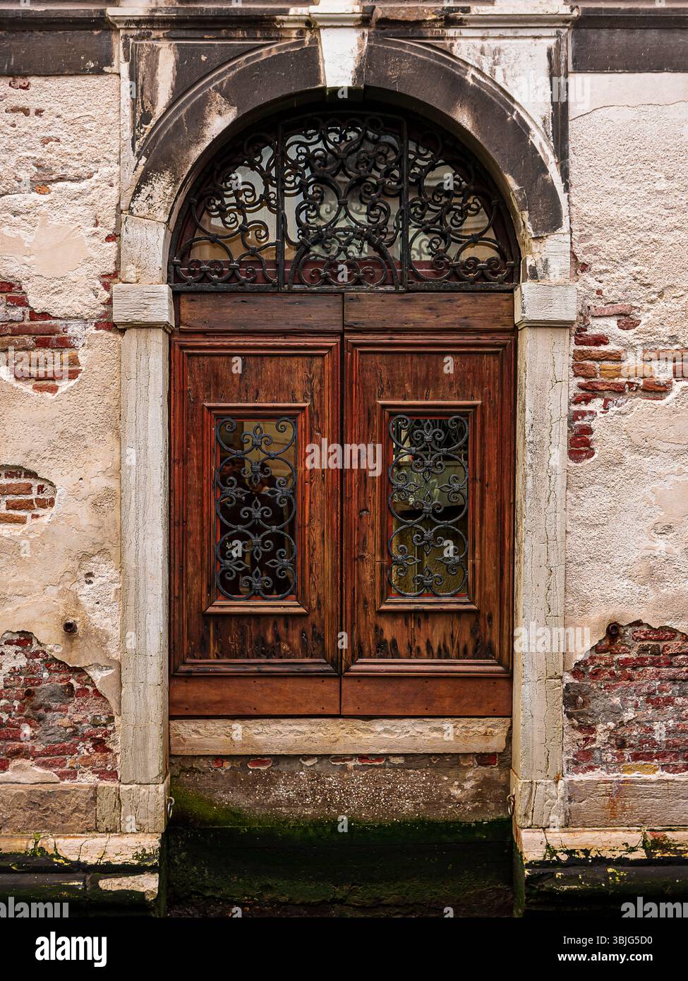 a classic entrance door of a house in the Venice canal Stock Photo - Alamy