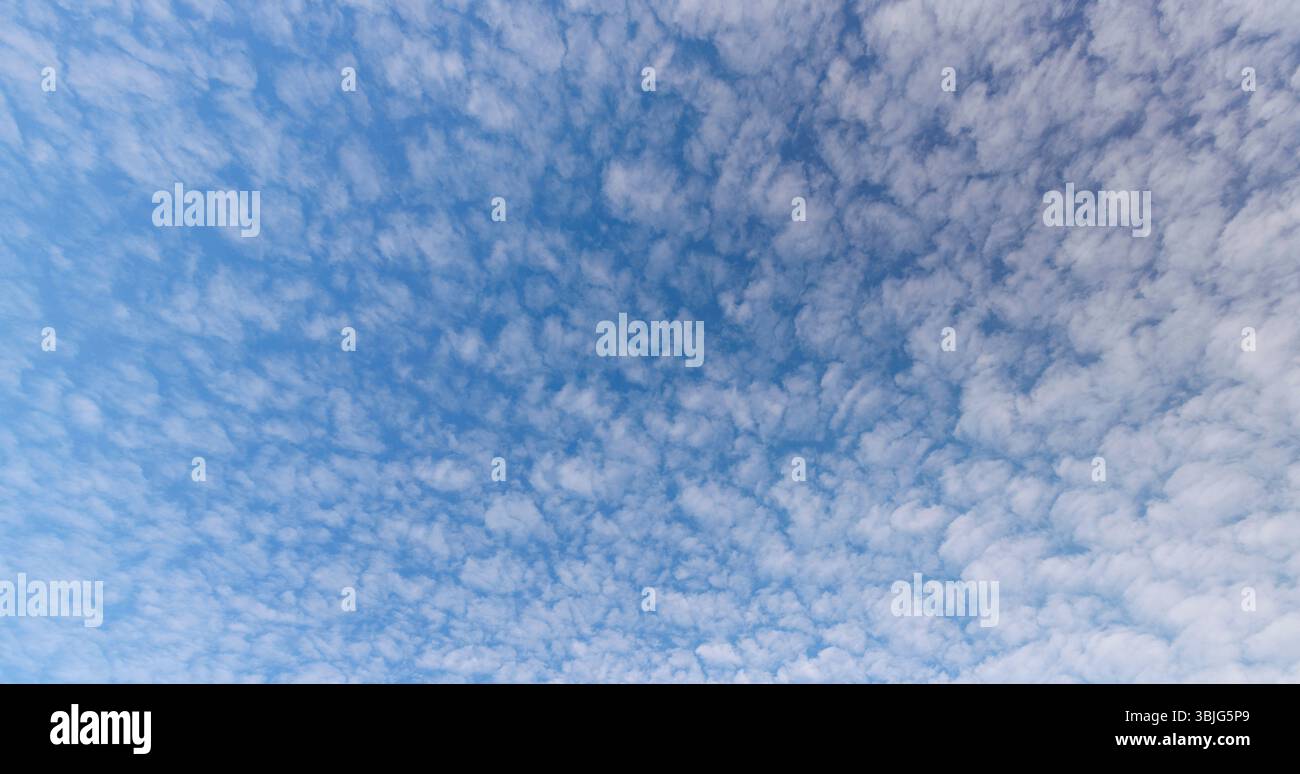 Altocumulus clouds at blue sky,Finland Stock Photo - Alamy