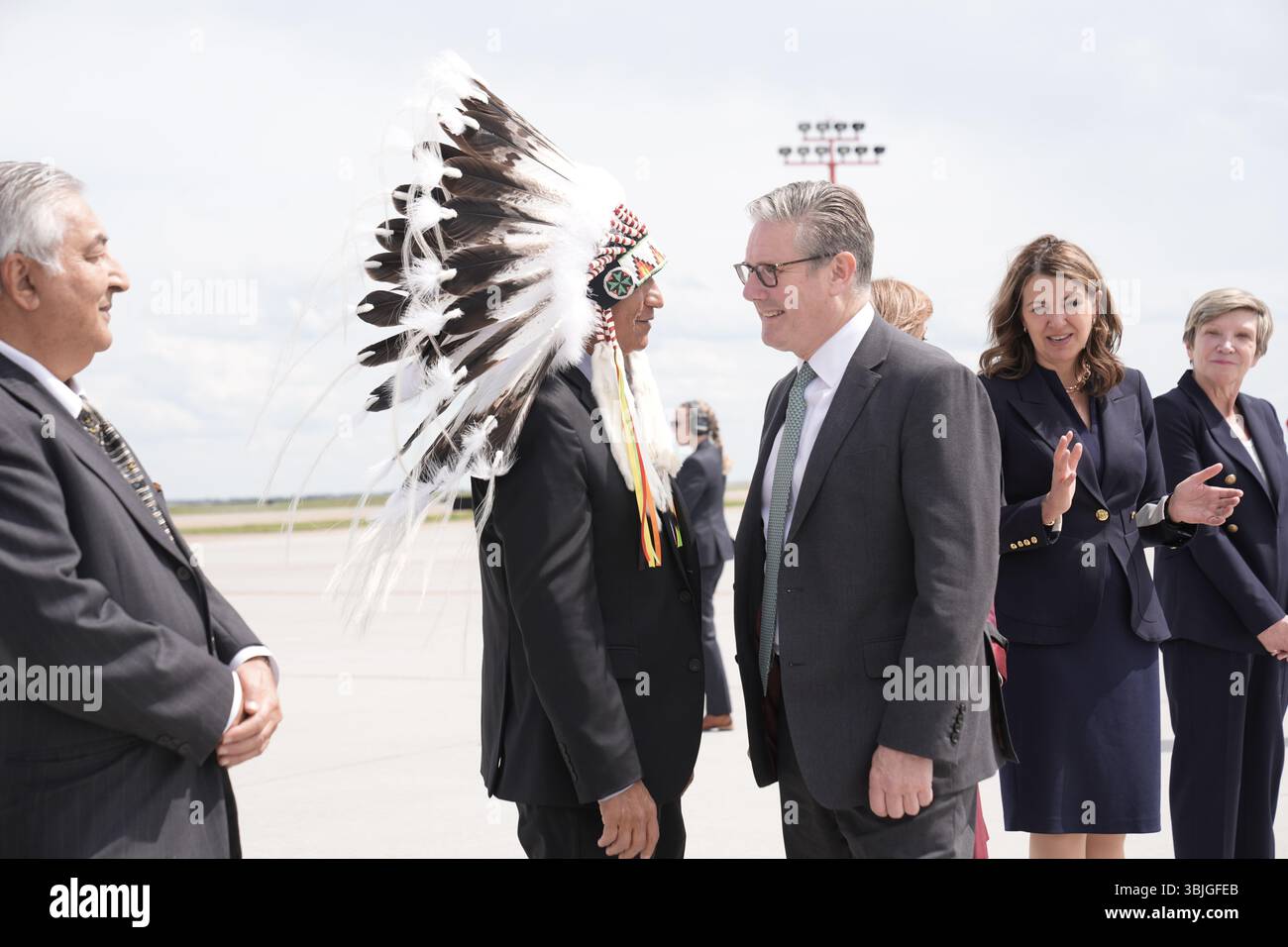 Prime Minister Sir Keir Starmer is greeted by Bearspaw First Nation ...