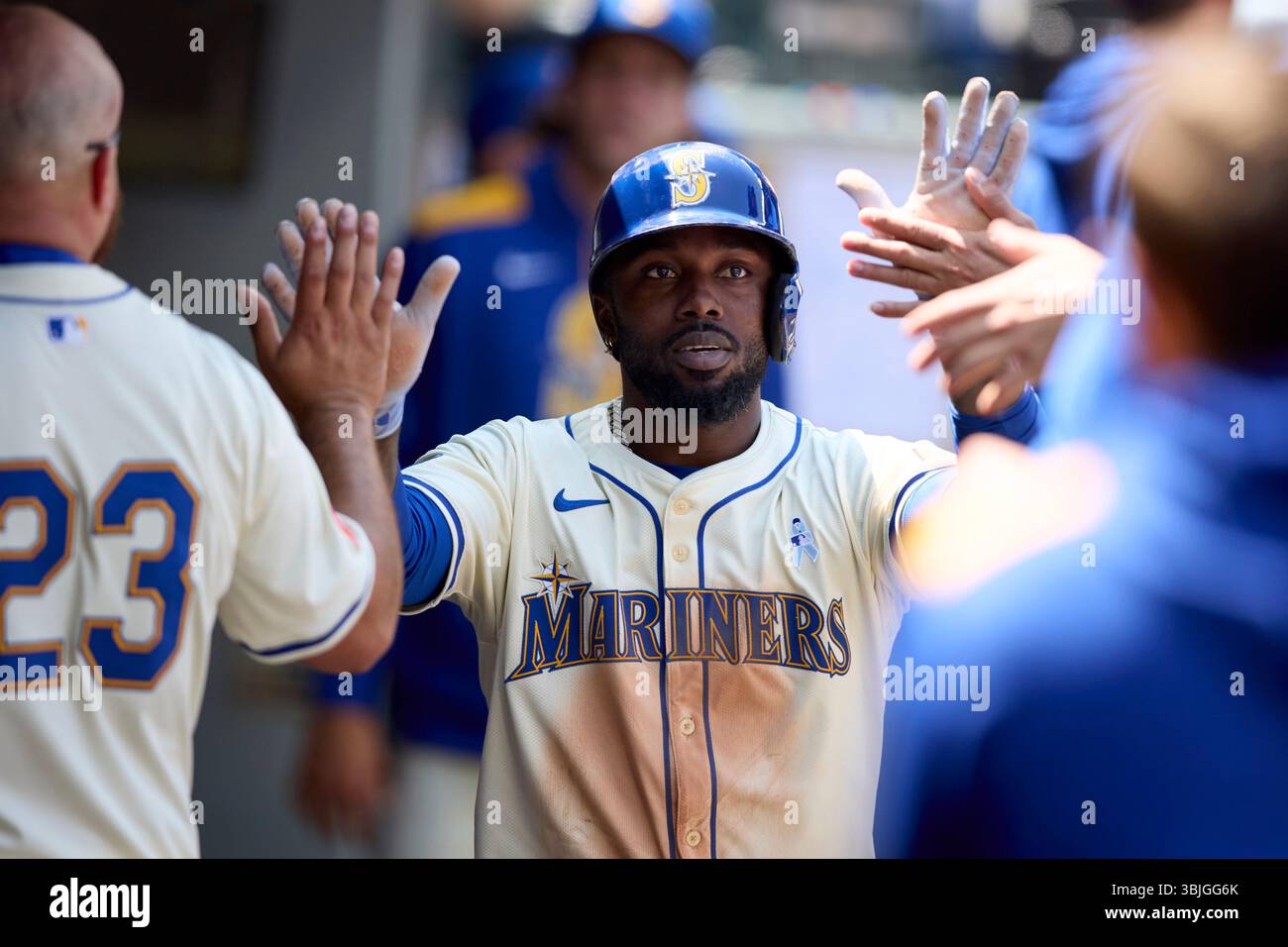 Seattle Mariners Randy Arozarena is greeted in the dugout after scoring ...