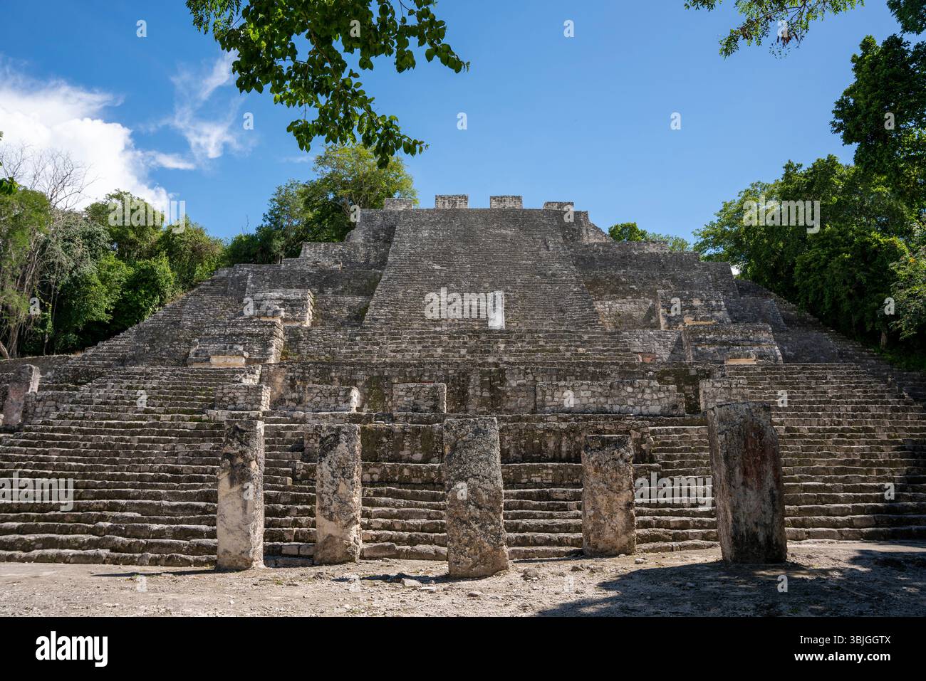 Maya Structure II pyramid with stone steps and platforms surrounded by ...