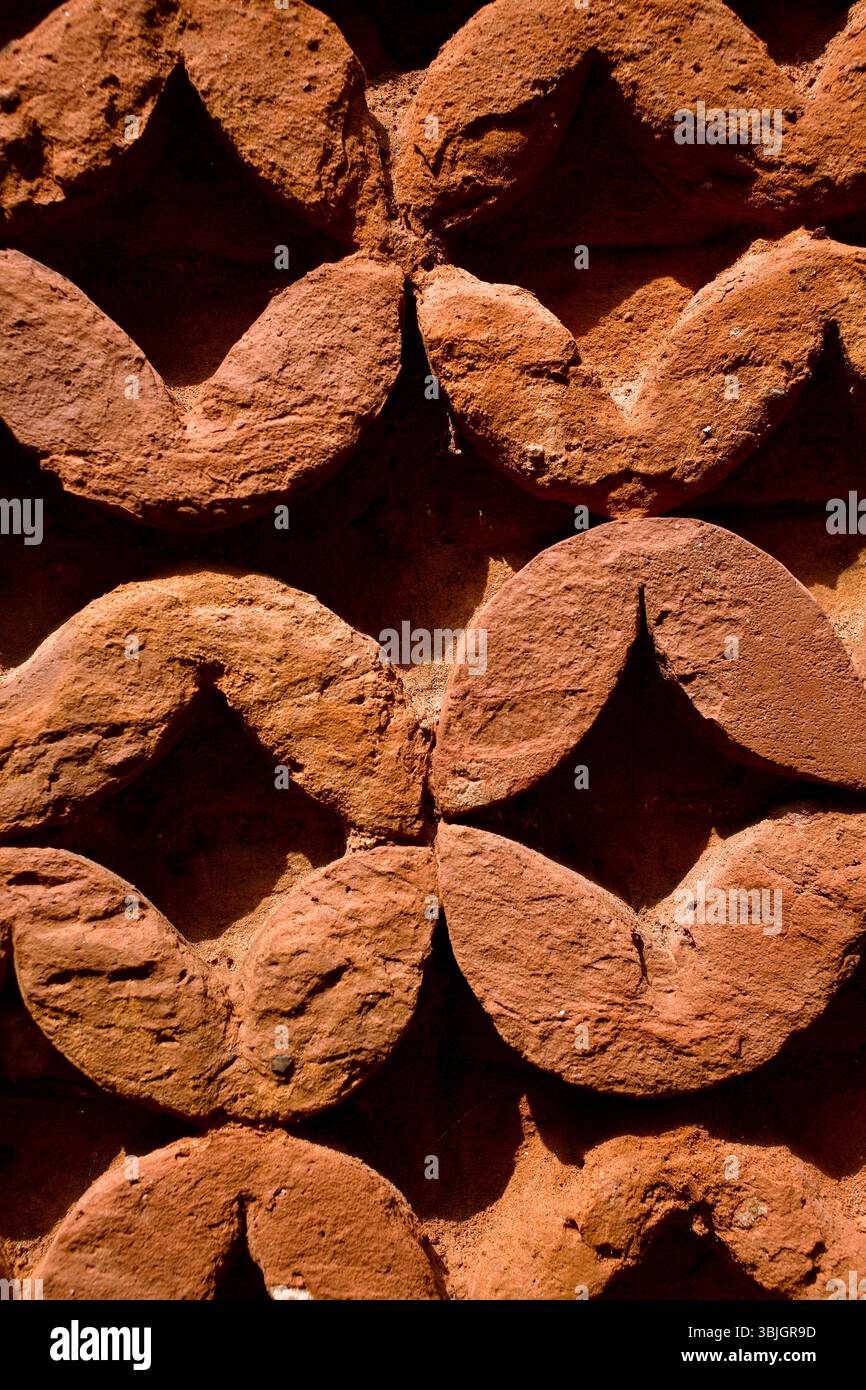 Close-up of terracotta ornamentation on the Nine-Dome Mosque in ...