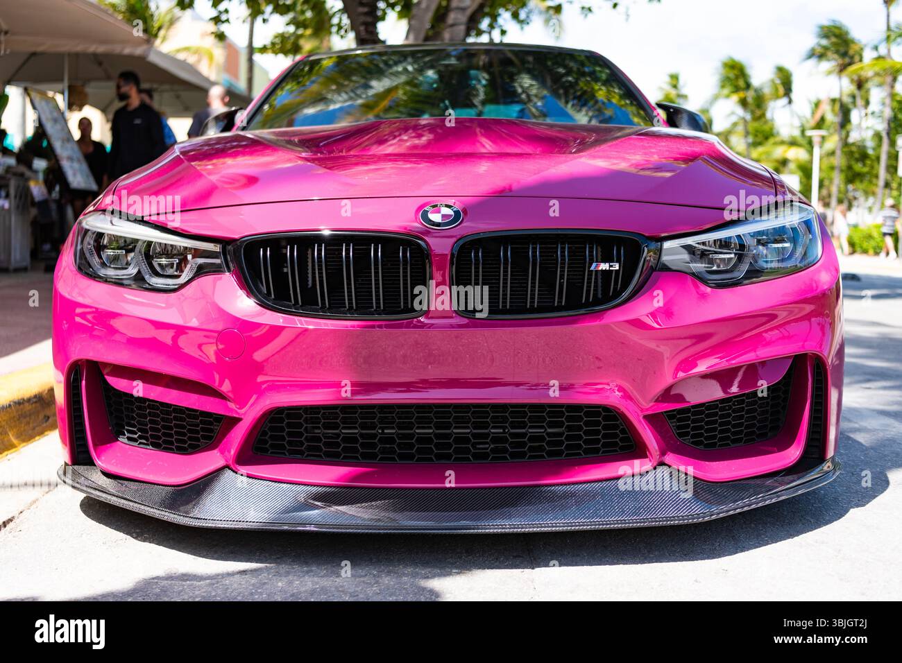 Miami, Florida, USA - April 04, 2025: Pink coupe car, front view. BMW ...