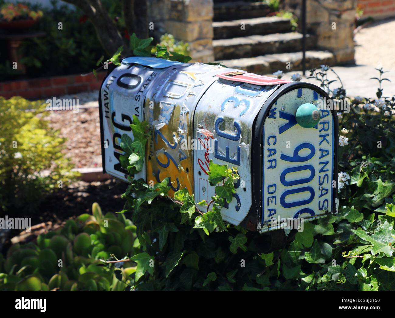 Monterey, CA, USA - 15 June 2025. Weathered mailbox made of colorful ...