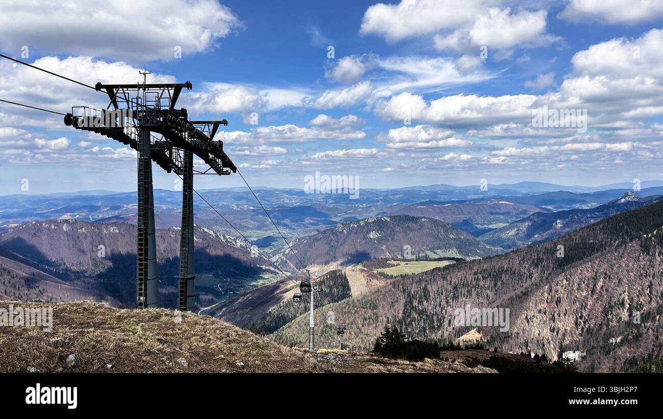 Spectacular mountain view with towers of cable car bringing tourist for ...