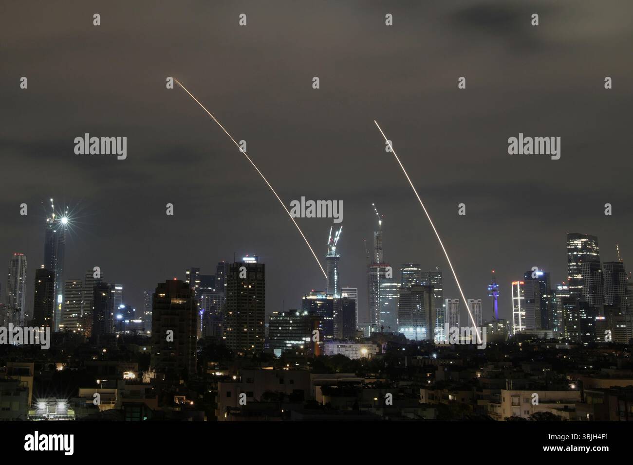 The Israeli Iron Dome air defense system fires to intercept missiles ...