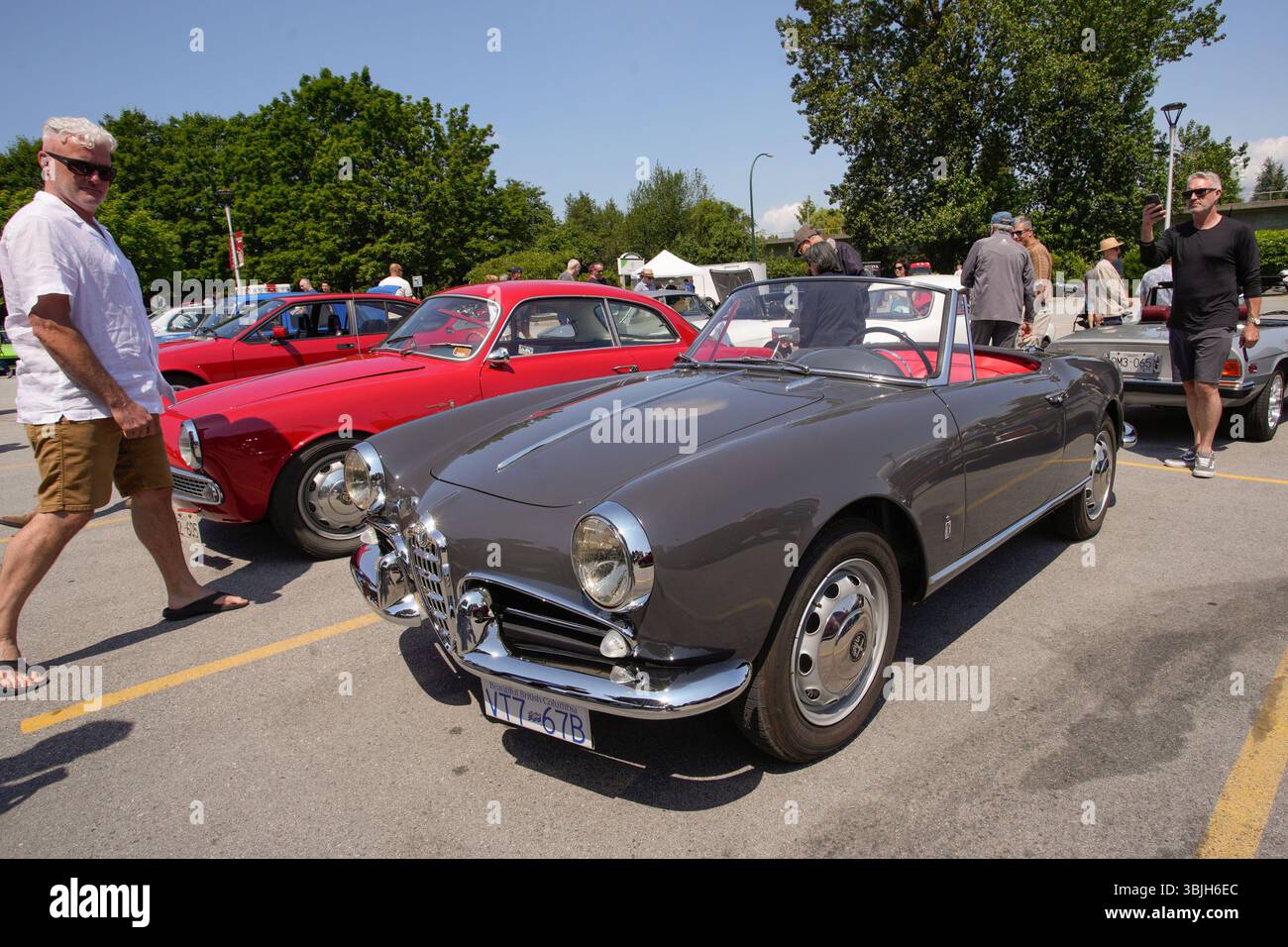 Vancouver, Canada. 15th June, 2025. People view a classic car during ...
