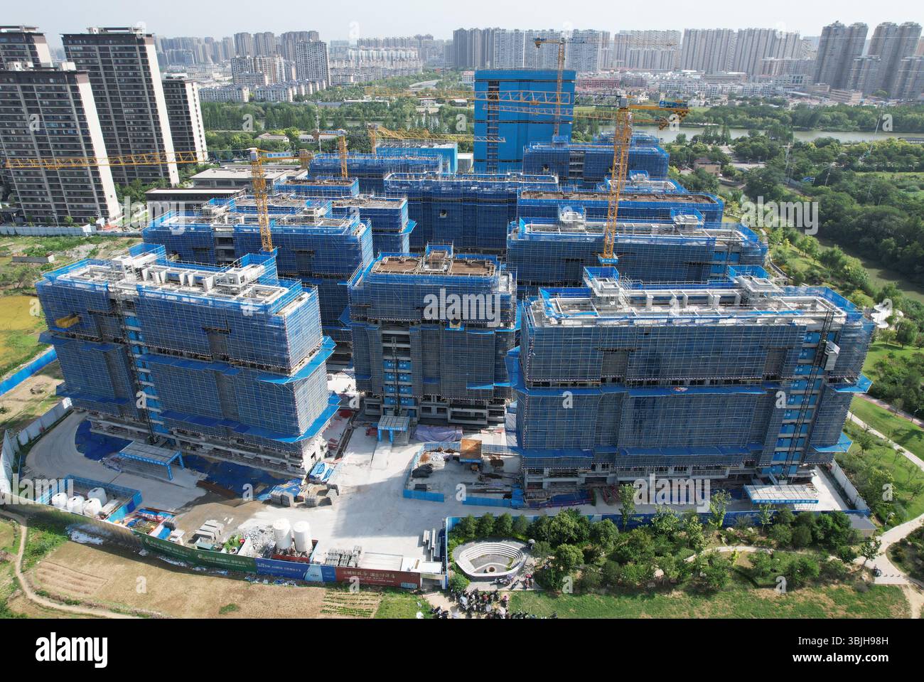FUYANG, CHINA - JUNE 16, 2025 - A construction site of a commercial ...
