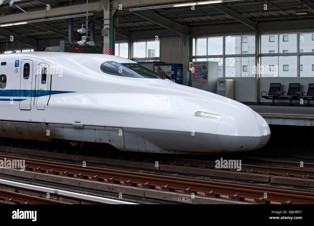 The Nozomi N700 Series JR super express shinkansen bullet train stopped at Shin-Yamaguchi ...