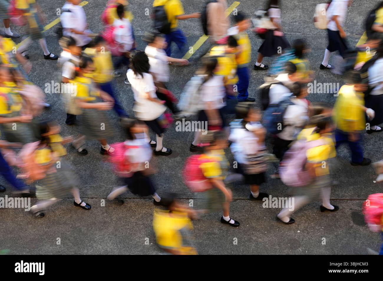 Students walk to their classrooms during the opening of the new school ...