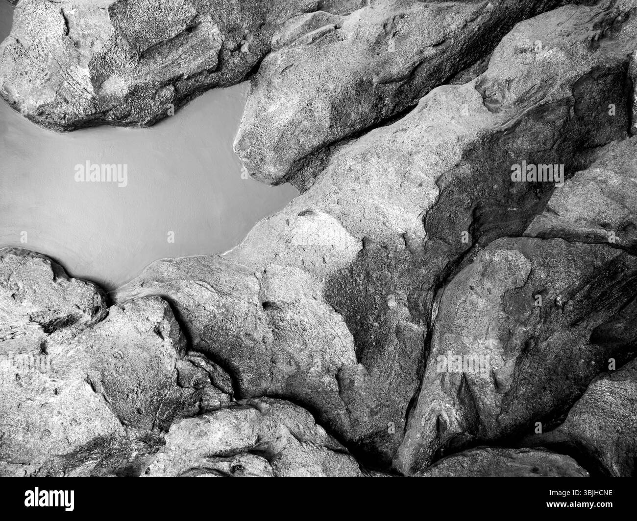 Abstract black and white wall hard rock background with blank space ...