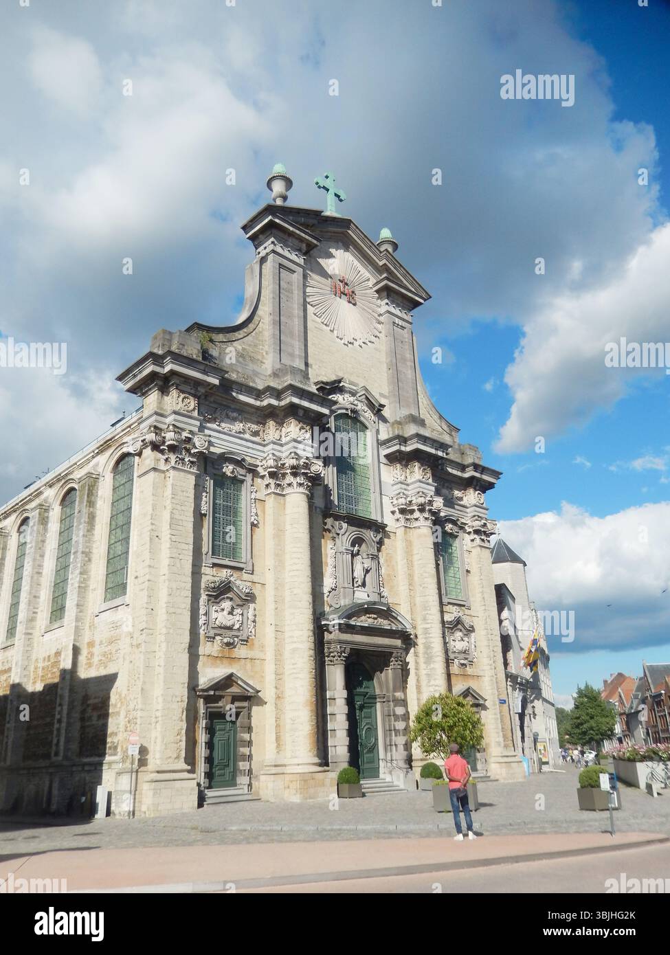 Historical European Church Facade Under a Bright Blue Sky. Mechelen ...