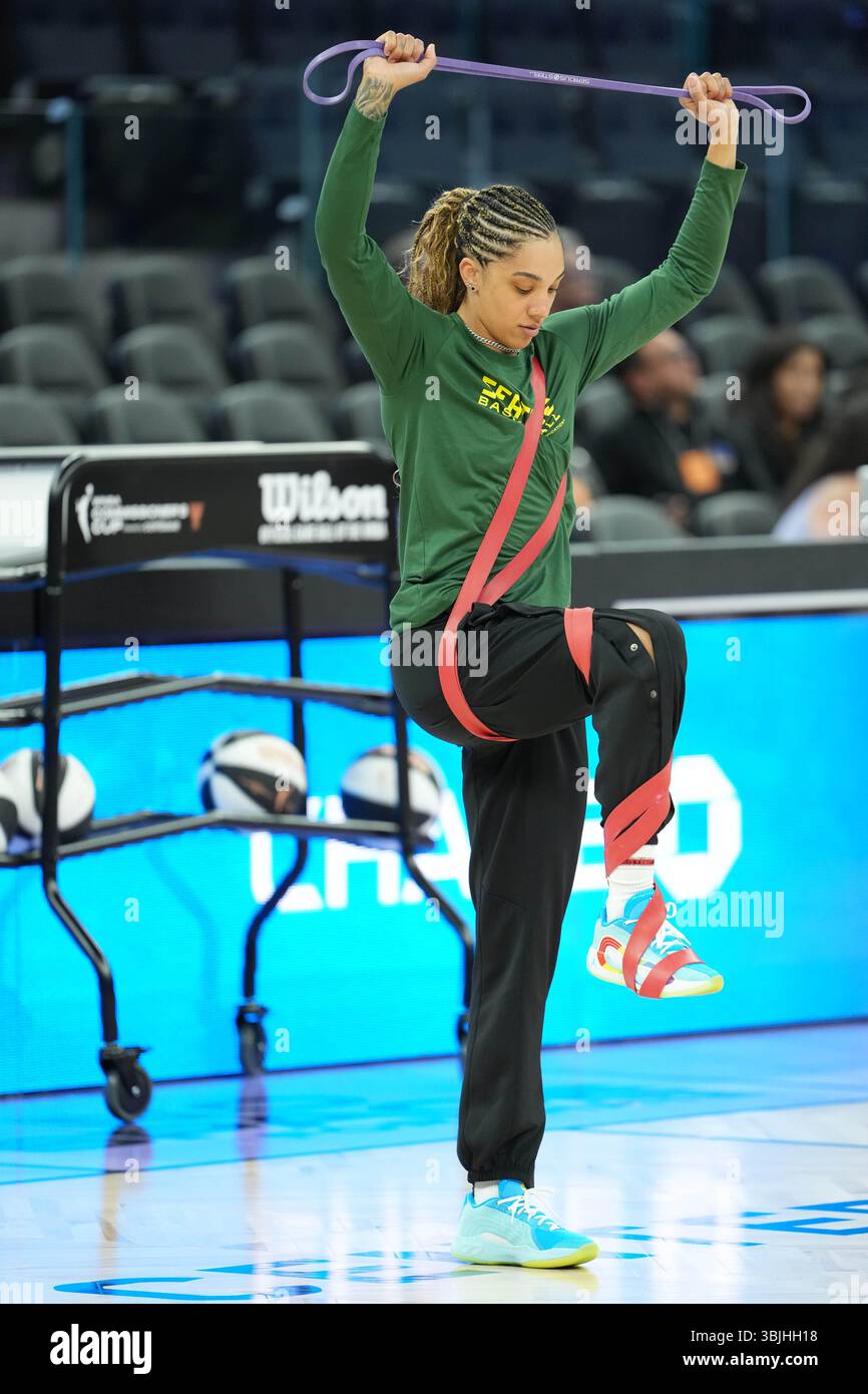 Seattle Storm forward Gabby Williams (5) doing her pregame stretching ...