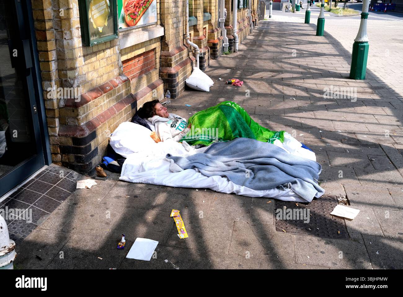 homeless woman sleeping rough in eastbourne town, east sussex,uk Stock ...