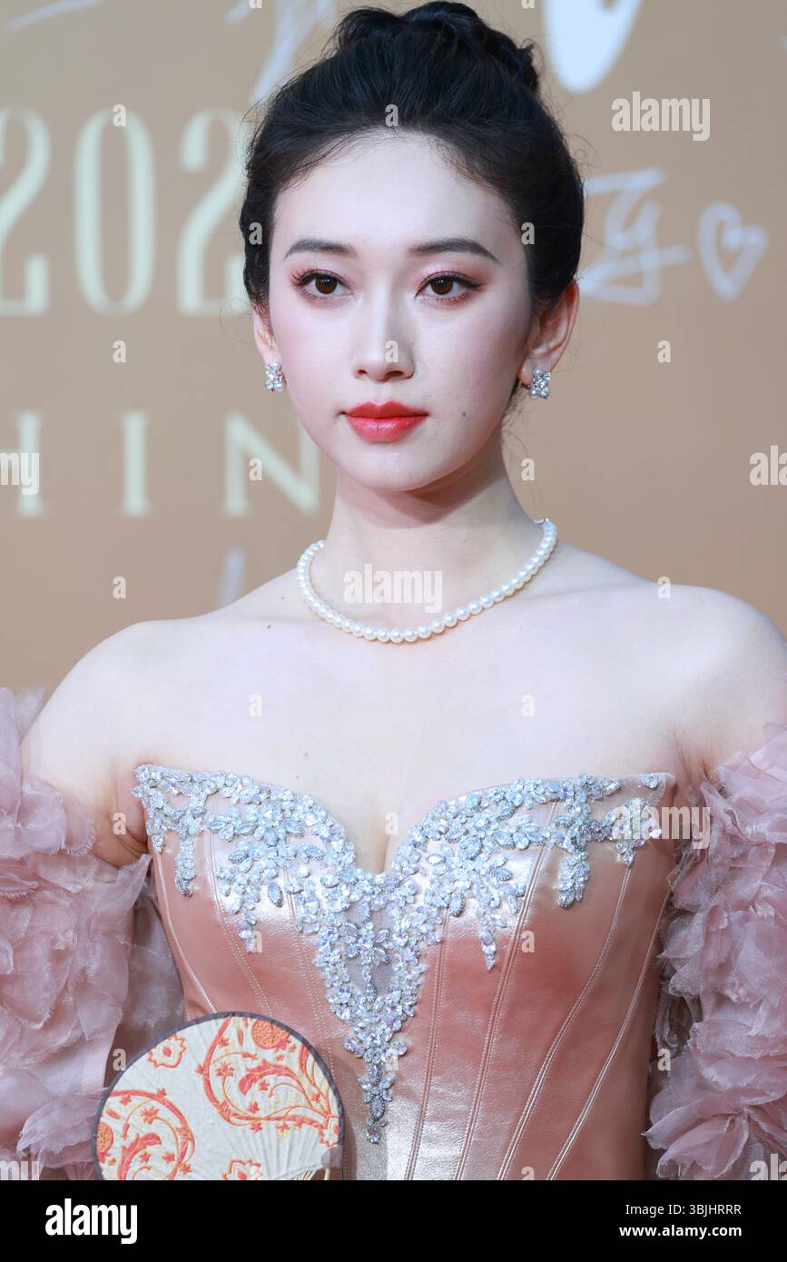 Chinese singer and actress Liu Lingzi attends an activity in Shanghai ...