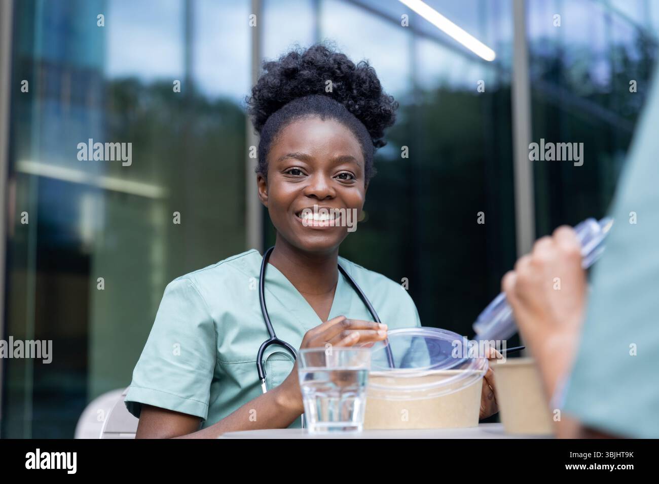 Doctors colleagues having lunch together in the cafe Stock Photo - Alamy