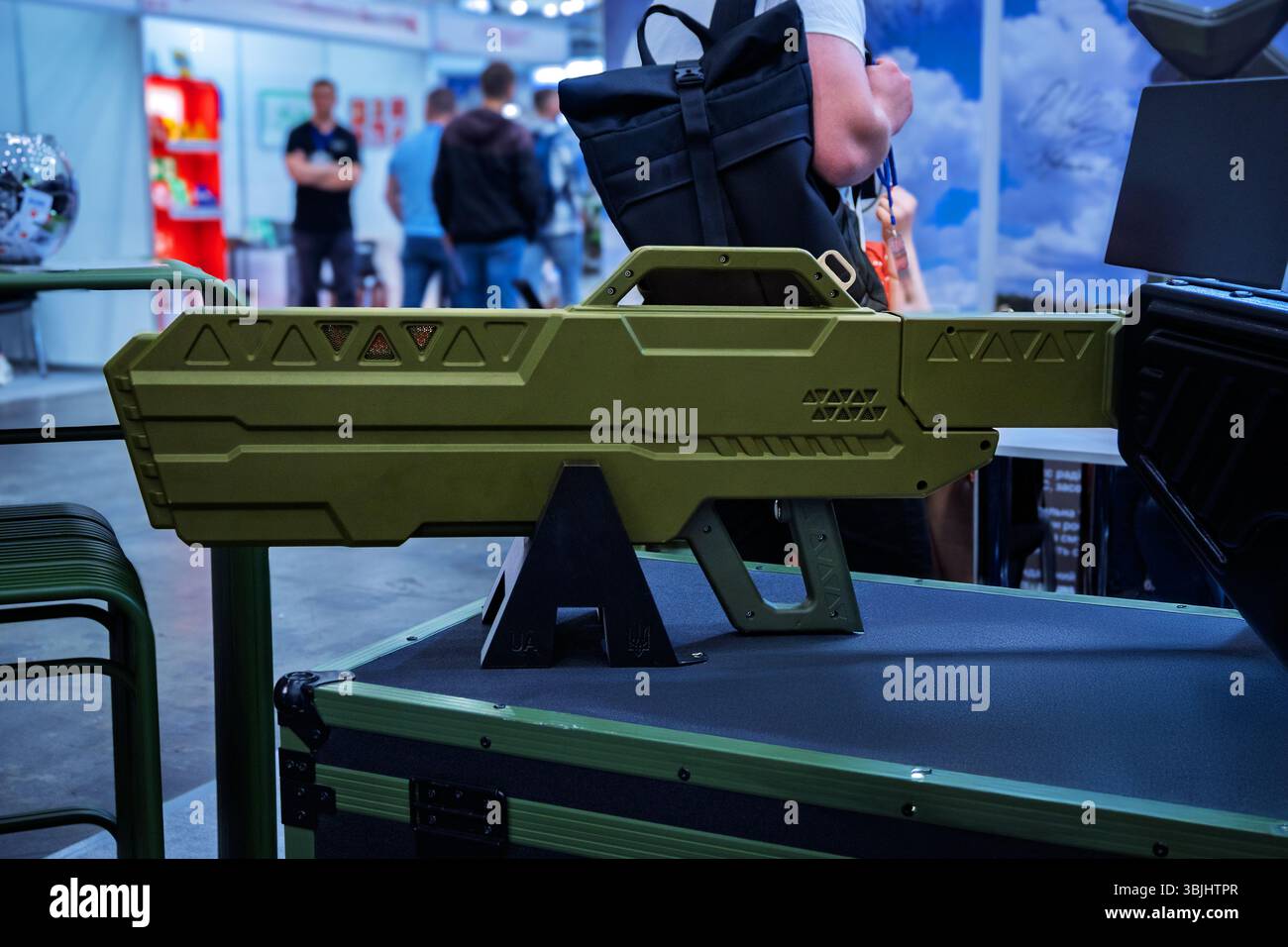 Military green anti-drone rifle system on display at defense exhibition ...
