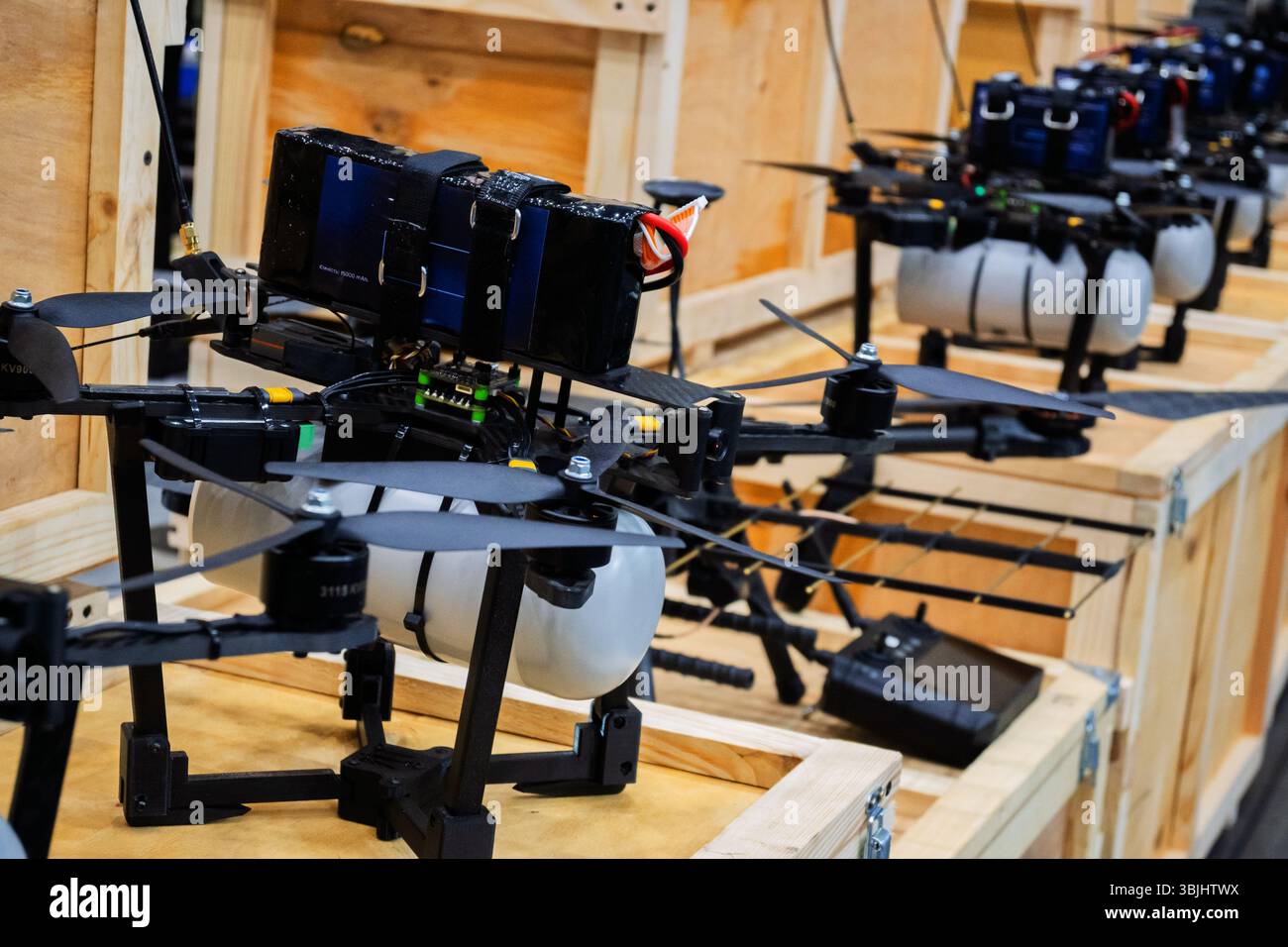 Aerial Drones with Camera Systems Arrayed in a Row Ready for Flight ...