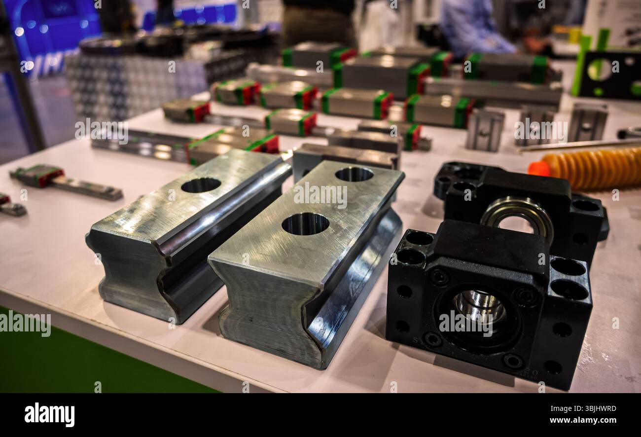 Assortment of precision industrial mechanical components on display ...