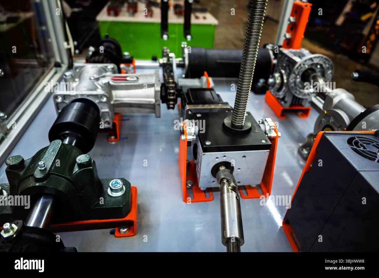 Close-up of industrial machinery components: metal casting, chain drive ...