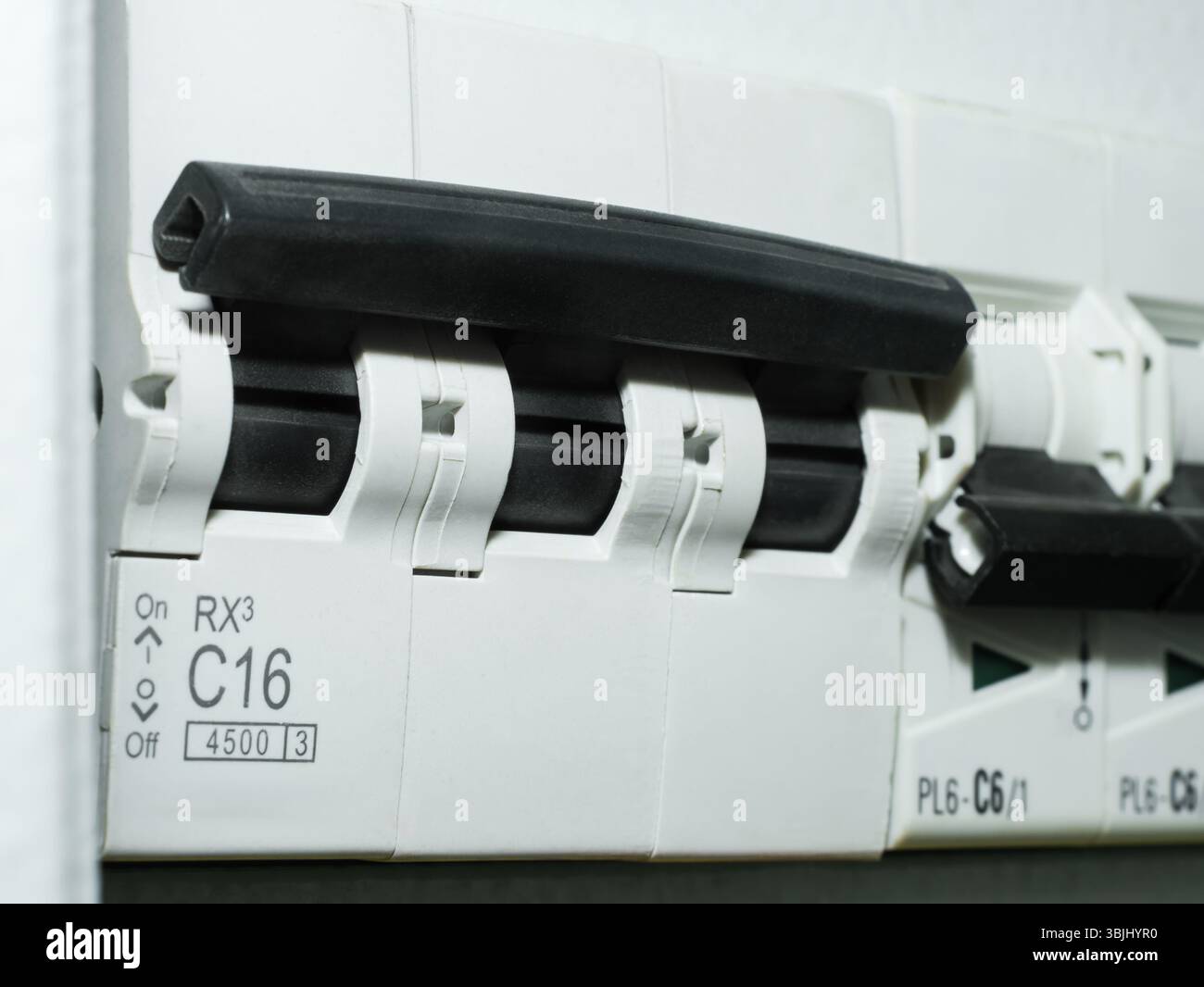 Three-phase circuit breaker in the on position Stock Photo - Alamy