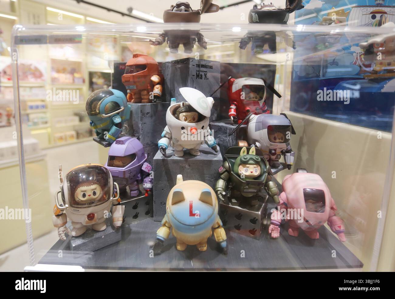 Labubu figures are displayed at a Pop Mart store in Shanghai, China, 12 ...