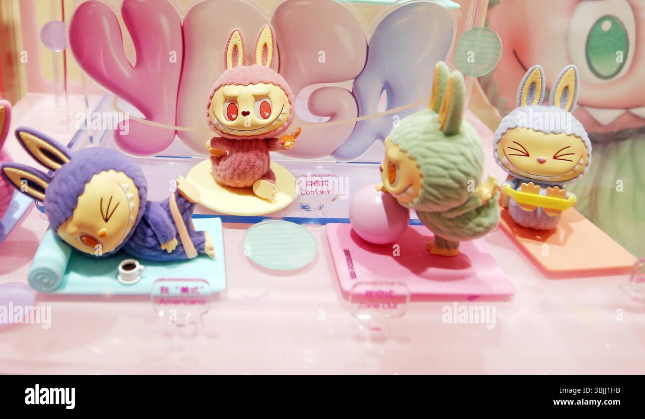 Labubu figures are displayed at a Pop Mart store in Shanghai, China, 12 ...