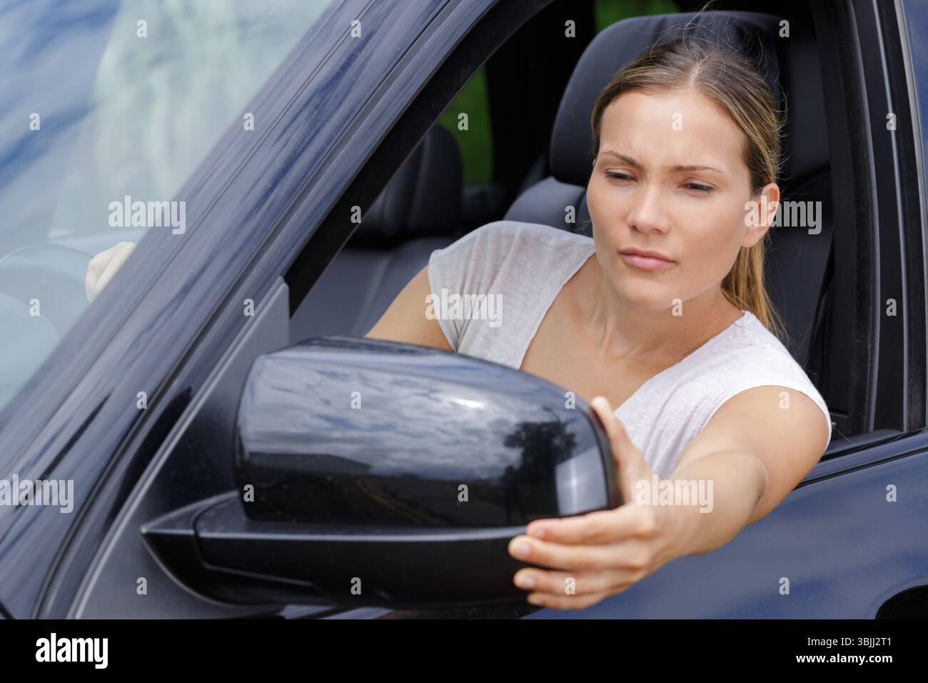 Side view woman driving manual car hi-res stock photography and images ...