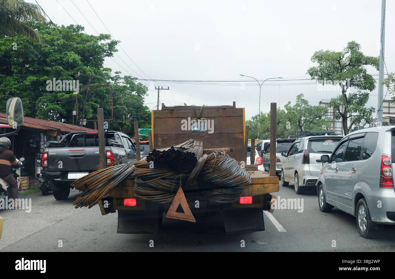 Pekanbaru, Indonesia - January 25, 2025: Truck carrying construction ...