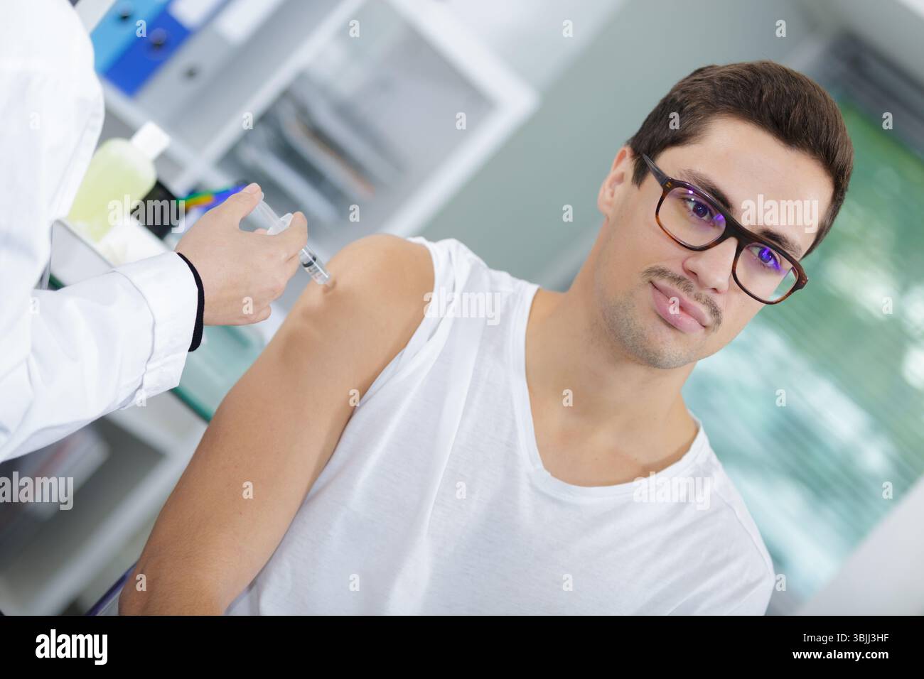 doctor doing tetanus toxoid injection Stock Photo - Alamy