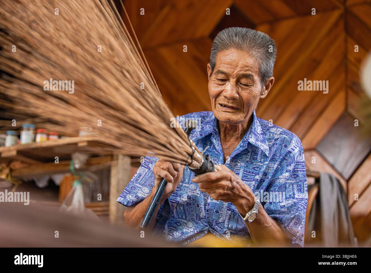 Craftsman securing traditional handmade hi-res stock photography and ...