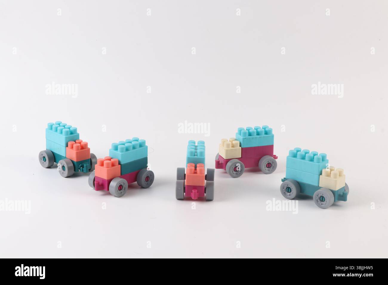 Toy train bricks isolated in white background Stock Photo - Alamy