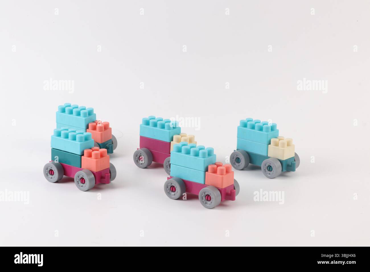 Toy train bricks isolated in white background Stock Photo - Alamy